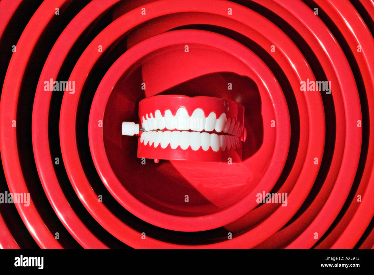 Toy teeth in bowls Stock Photo - Alamy