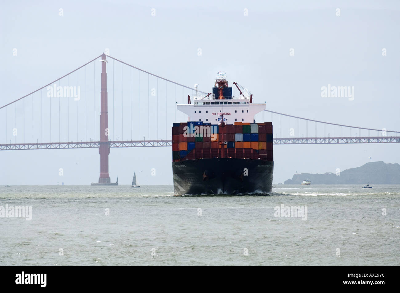 California, San Francisco Bay, Container ship and Bay Bridge Stock ...