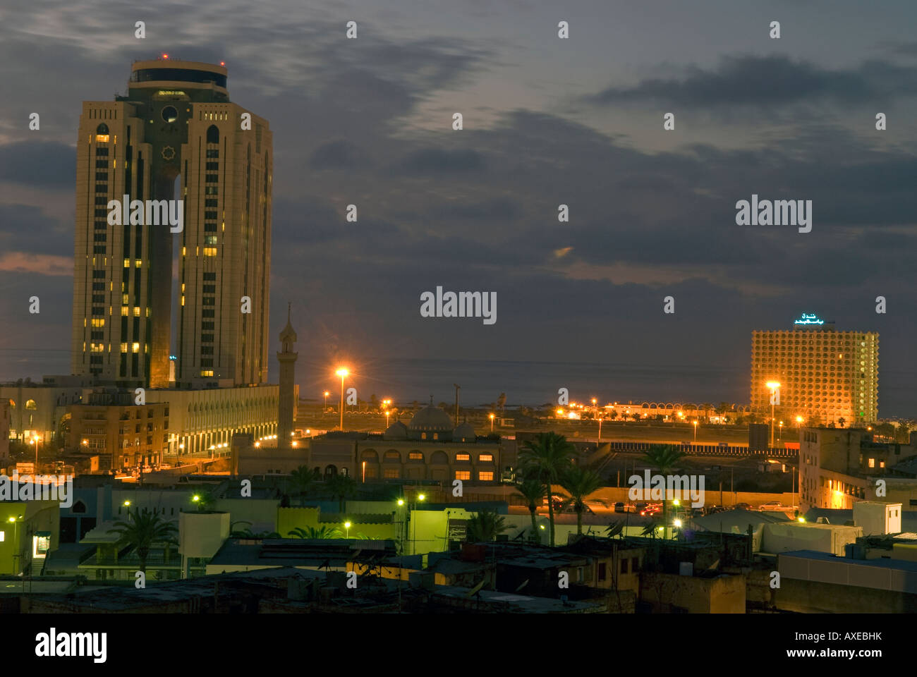 General view of the city of Tripoli by night showing the Al Fateh Tower ...
