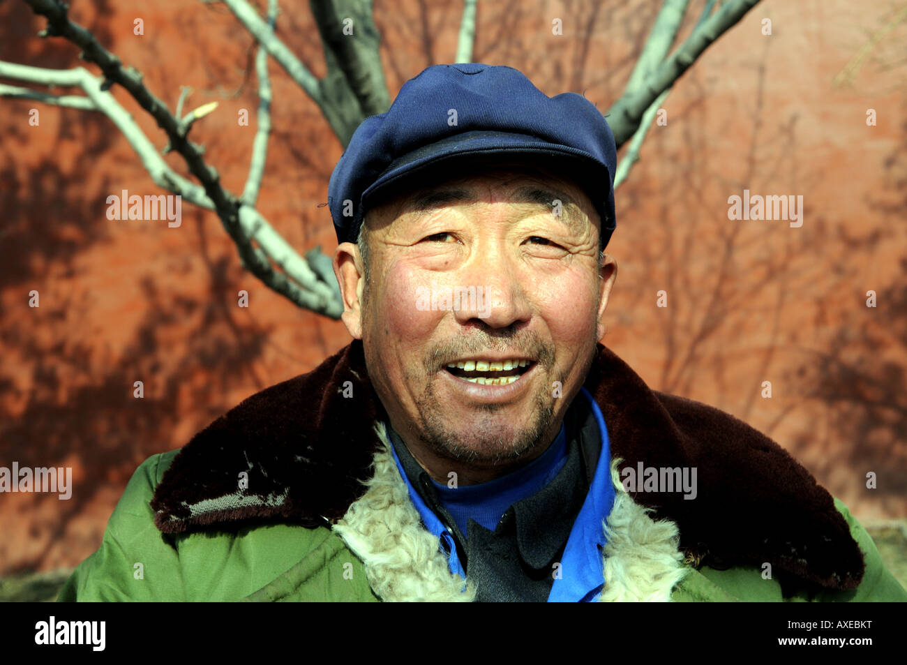 Portrait of a Chinese man wearing a traditional Mao cap Stock Photo - Alamy