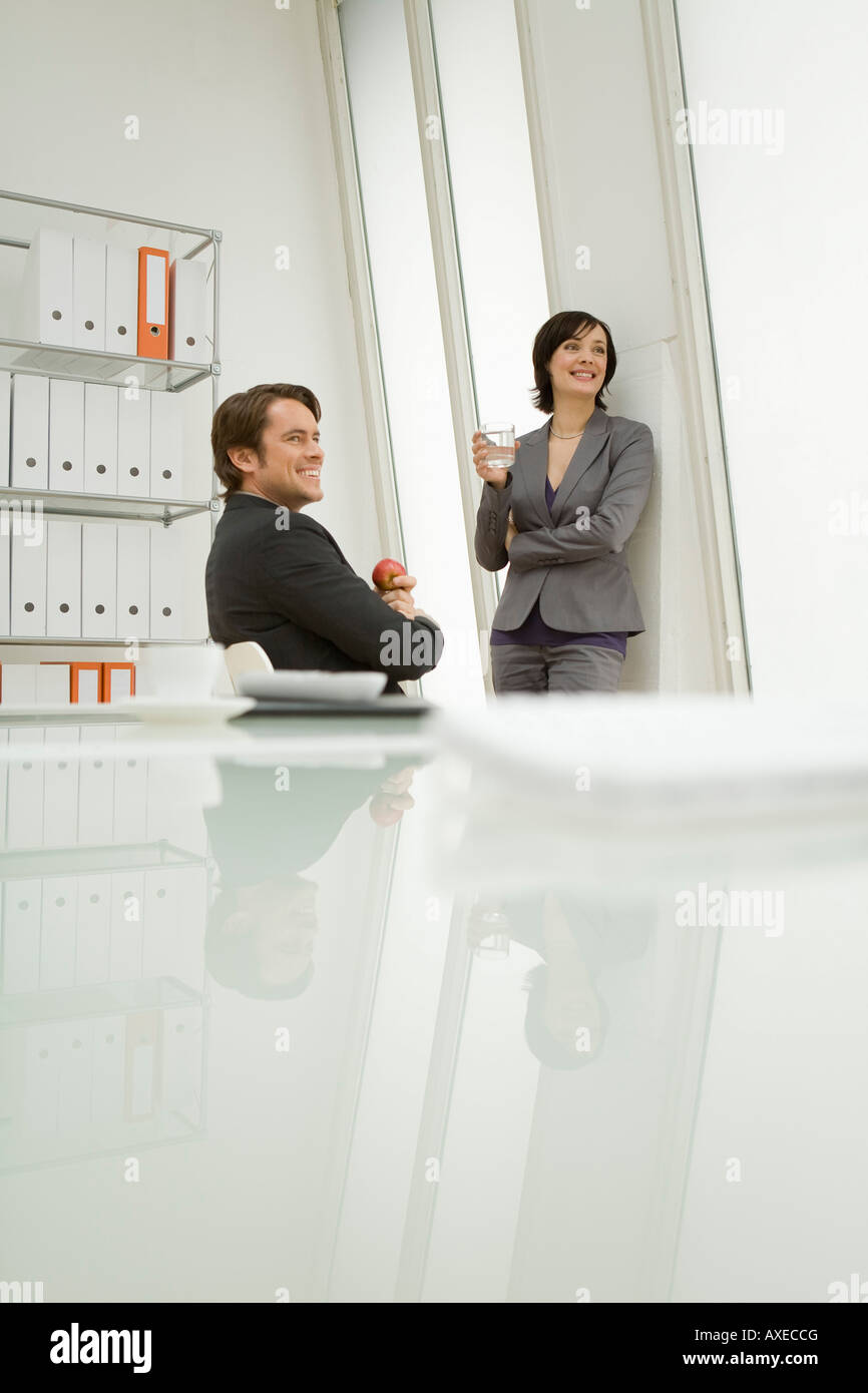 Two business people taking a break Stock Photo - Alamy