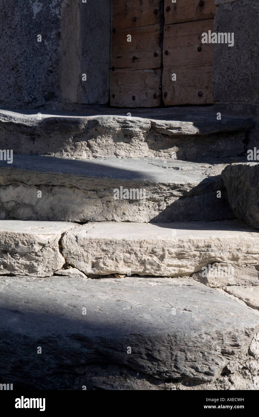 Stone frontdoor steps of an antique alpine house in Bormio, Italy Stock ...