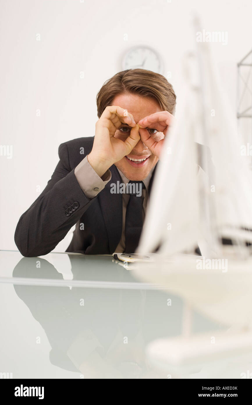 Man peering at work hi-res stock photography and images - Alamy