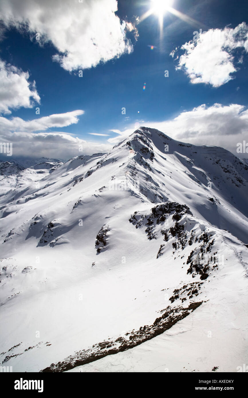 Bormio 3000 meters. Cimino top mountain with sunrays and blue sky Stock ...