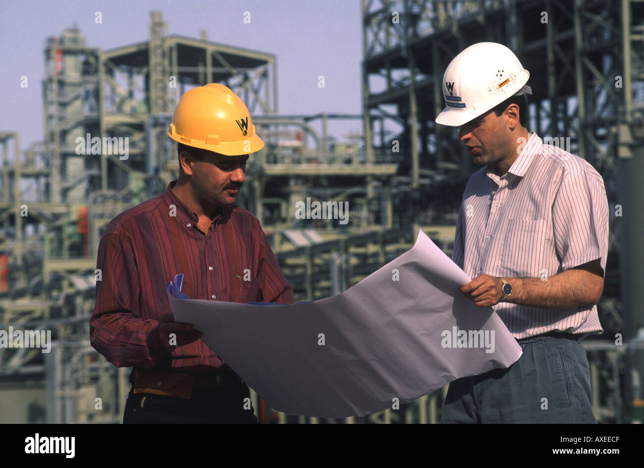Construction workers at Potash processing plant on the Dead Sea in ...