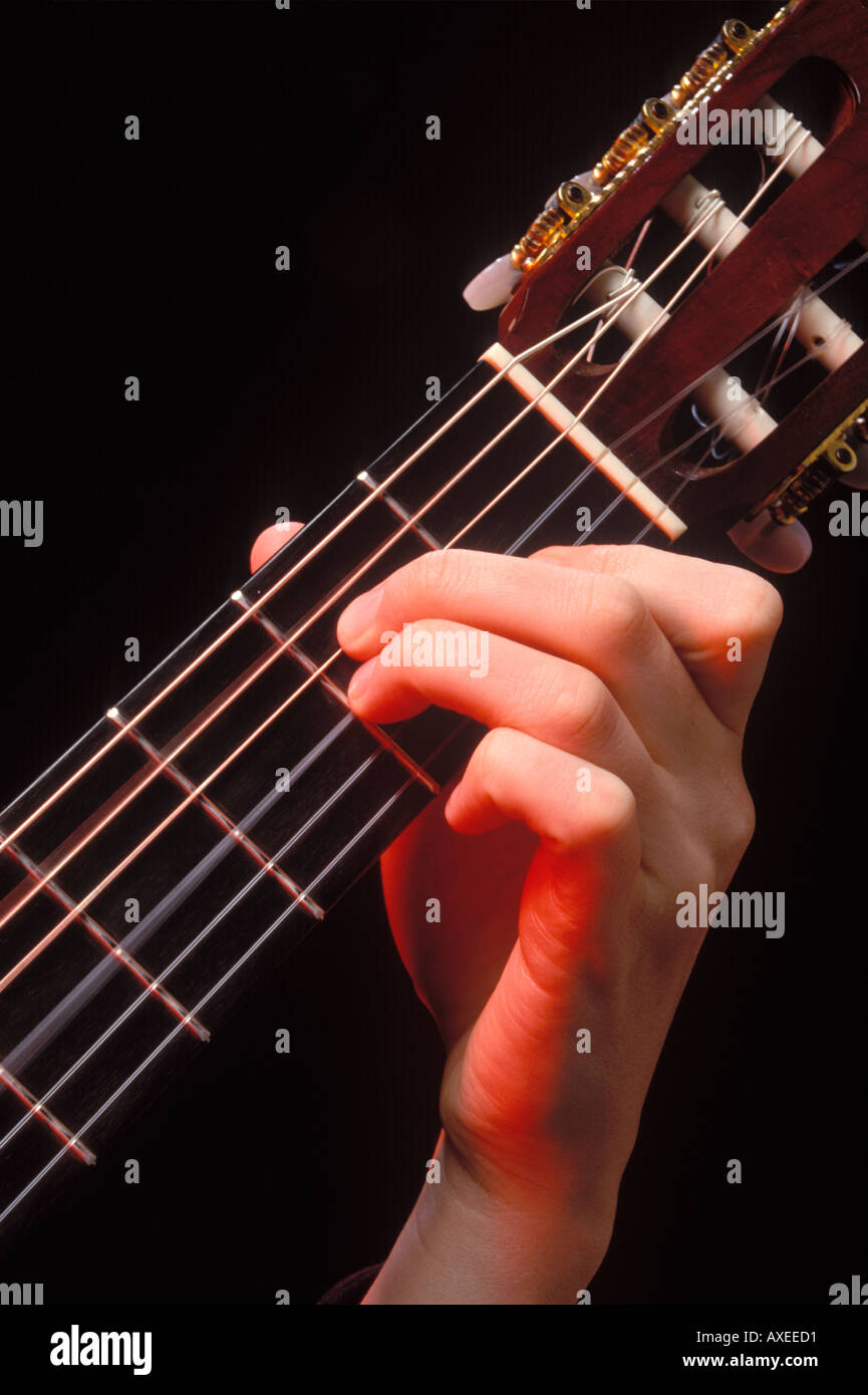 Aminor chord on classical guitar Stock Photo - Alamy