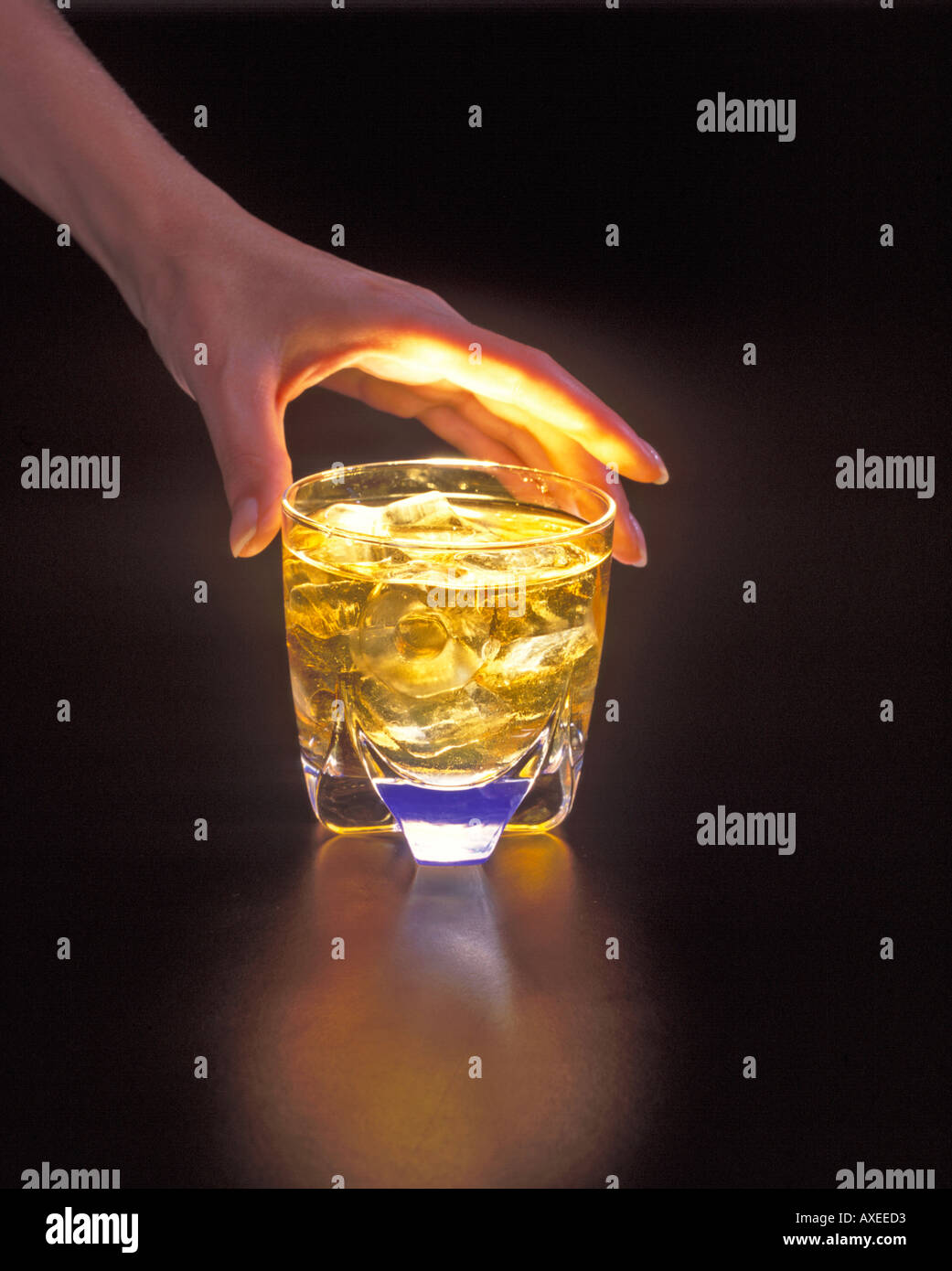 Hand reaching glass alcoholic drink hi-res stock photography and images ...