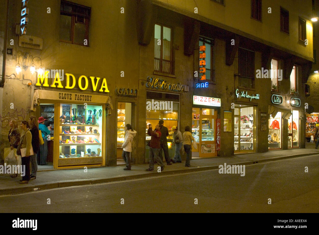 Florence. Shops on the Via de Guicciardini at night Stock Photo - Alamy