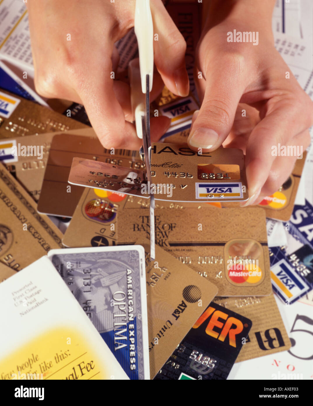 credit cards being cut Stock Photo - Alamy