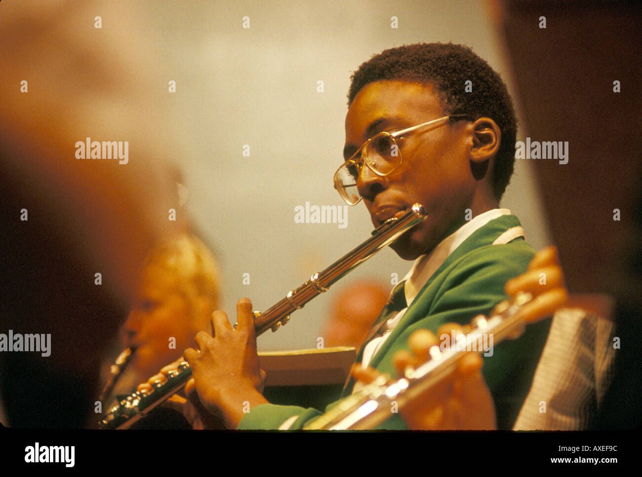 Africa Zimbabwe Boy plays flute in school orchestra Stock Photo - Alamy
