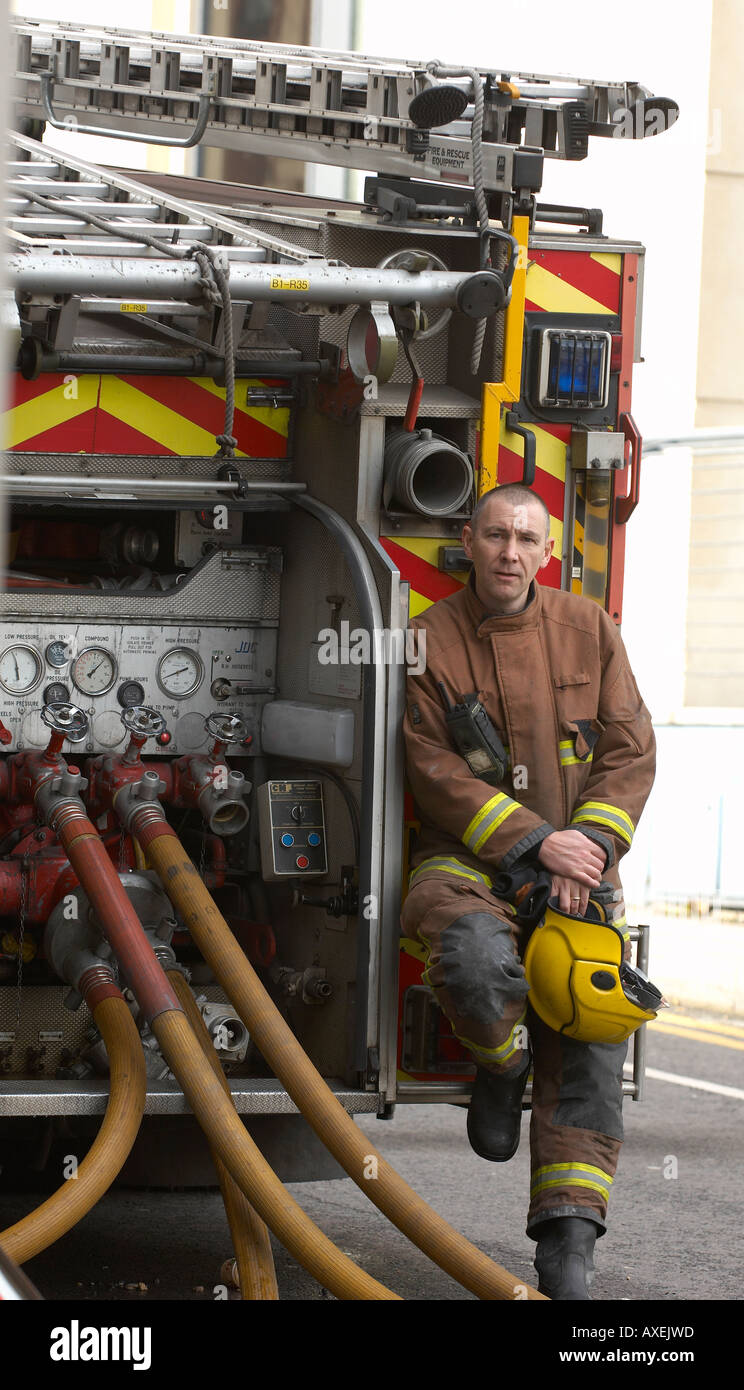 Fireman and fire engine Stock Photo - Alamy