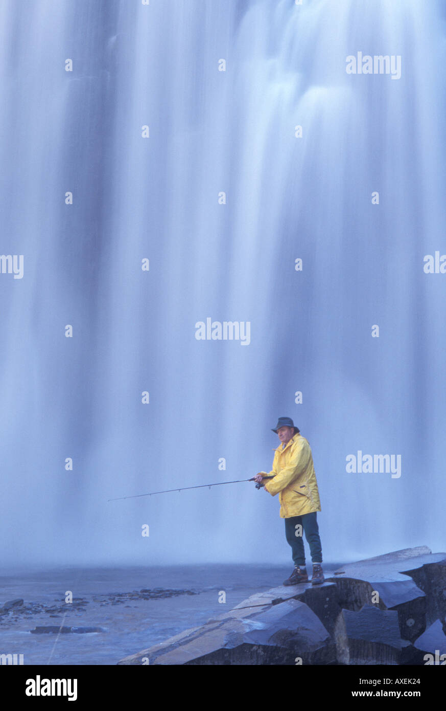 Man fishing waterfall hi-res stock photography and images - Alamy