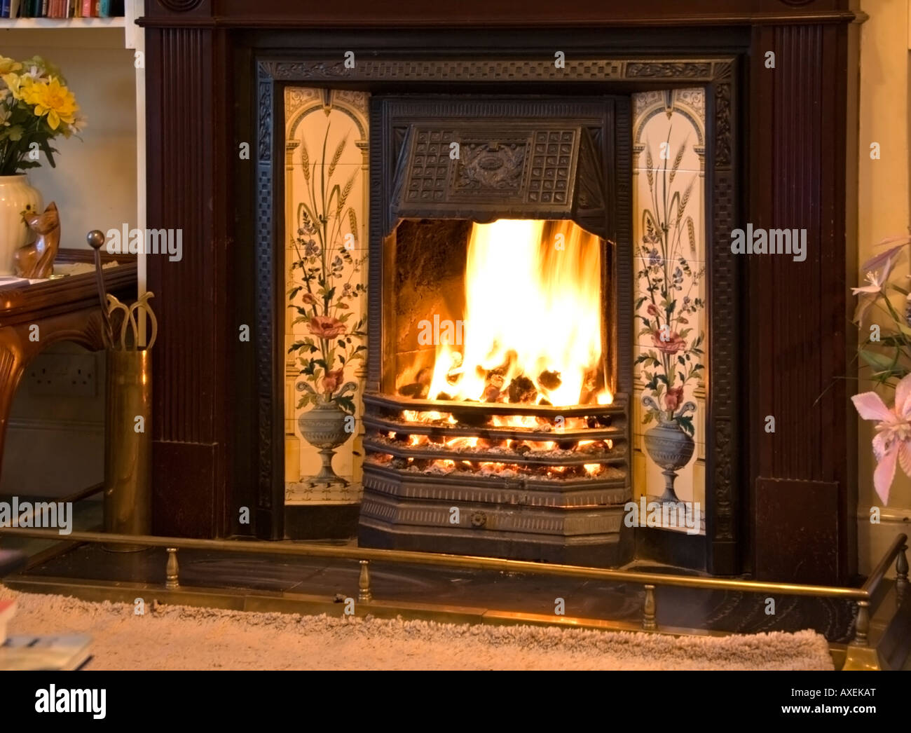 A blazing open fire in a victorian syle fireplace Stock Photo - Alamy