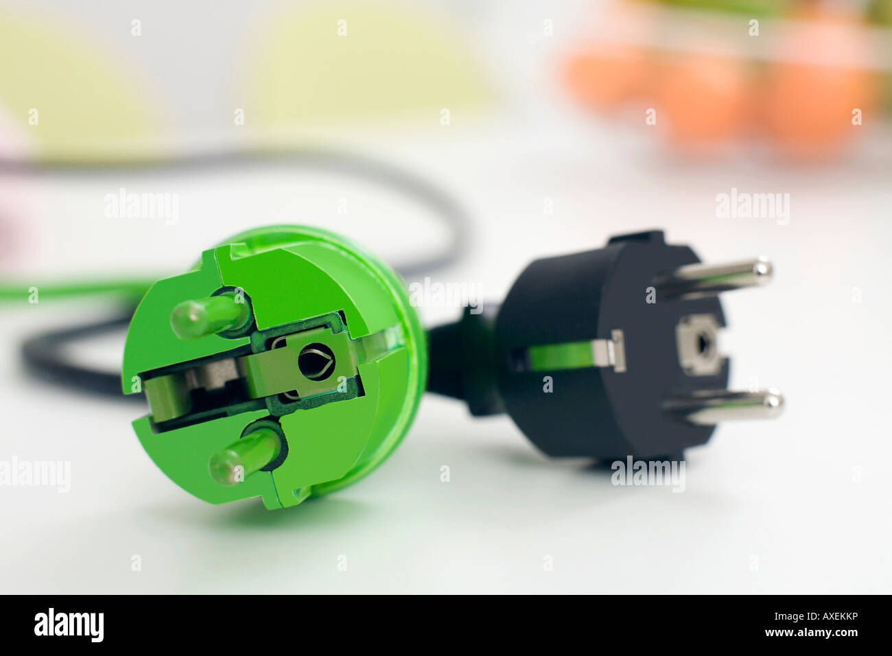 Black and green plugs, close-up Stock Photo - Alamy