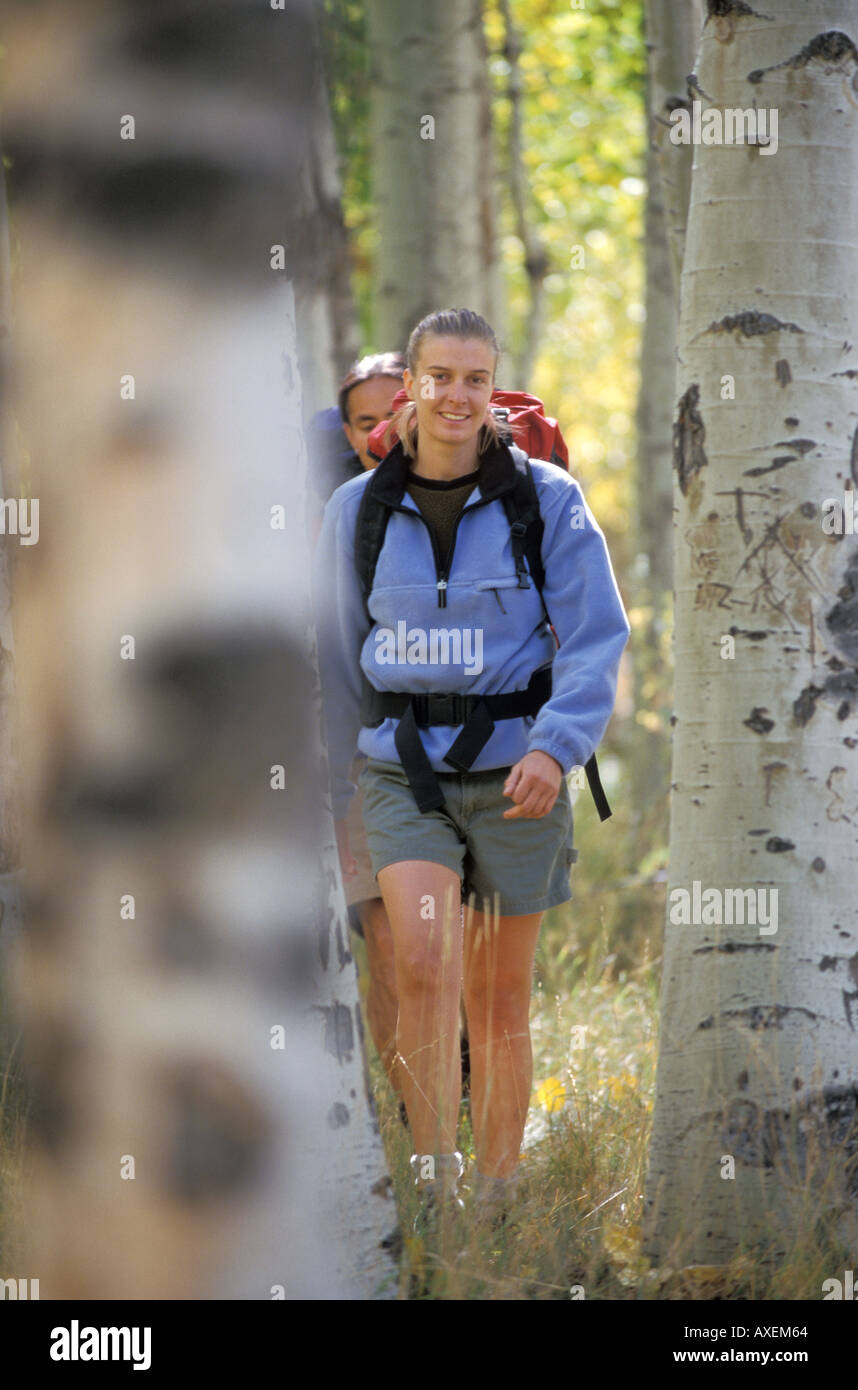 Man walking through mountain plants hi-res stock photography and images - Alamy