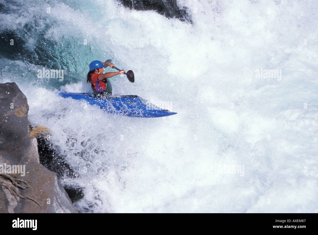 Kayaking Over A Waterfall Stock Photo - Alamy