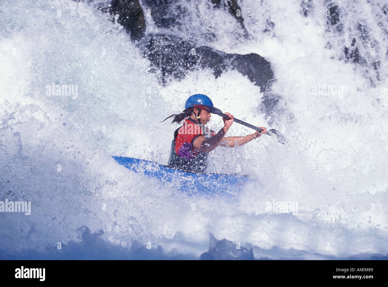 Kayaker paddling through waterfall hi-res stock photography and images ...