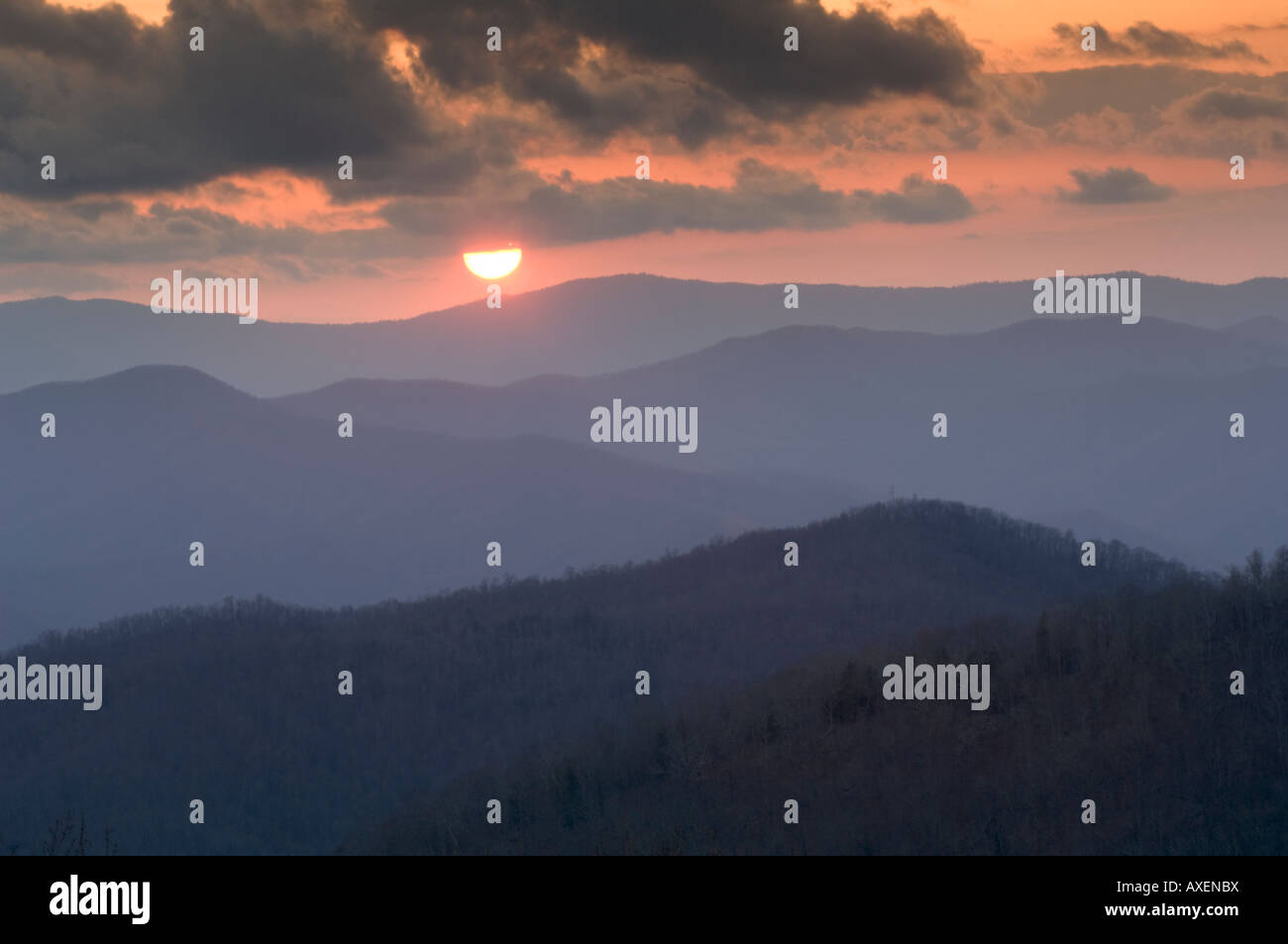 Sunrise illuminating mountains above hi-res stock photography and ...