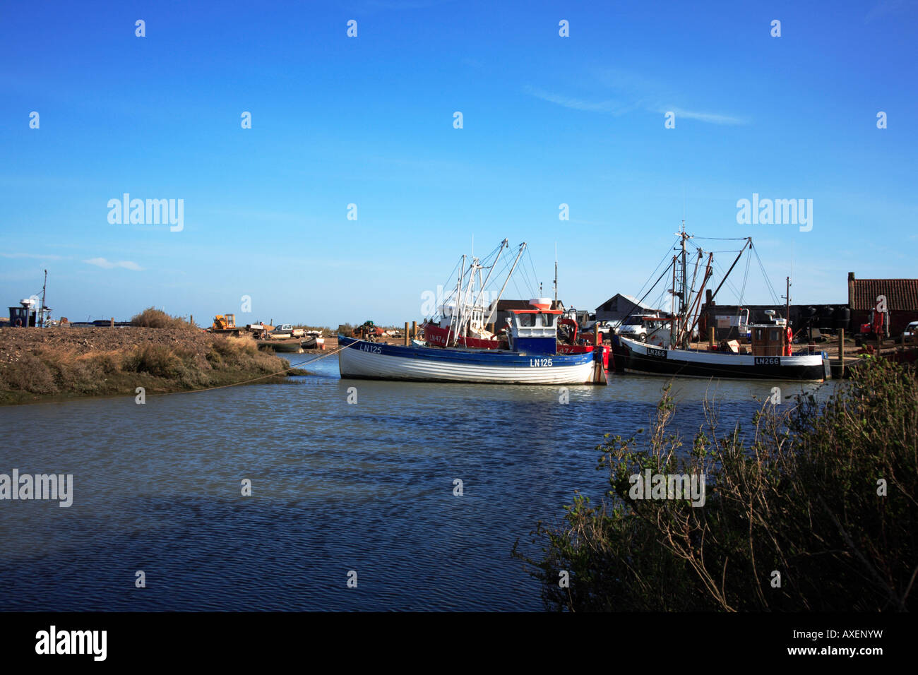Small Commercial Harbour with Boats at Brancaster Staithe, Norfolk, UK ...