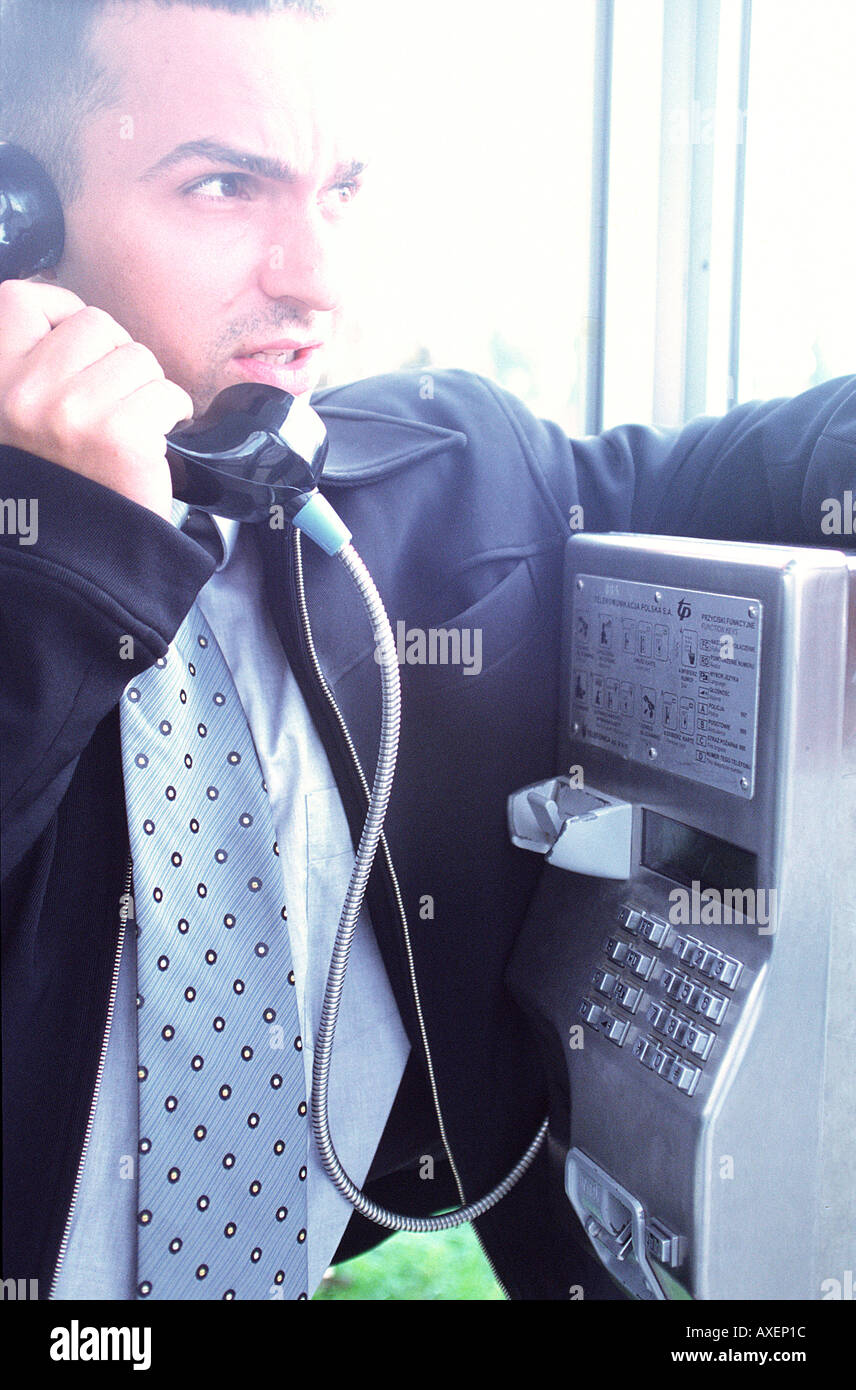 Public phone box man businessman hi-res stock photography and images ...
