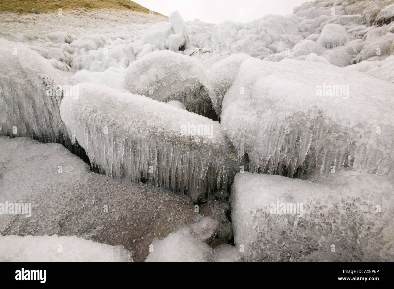 Icing on rocks caused by a strong wind blowing water onto frozen rocks ...