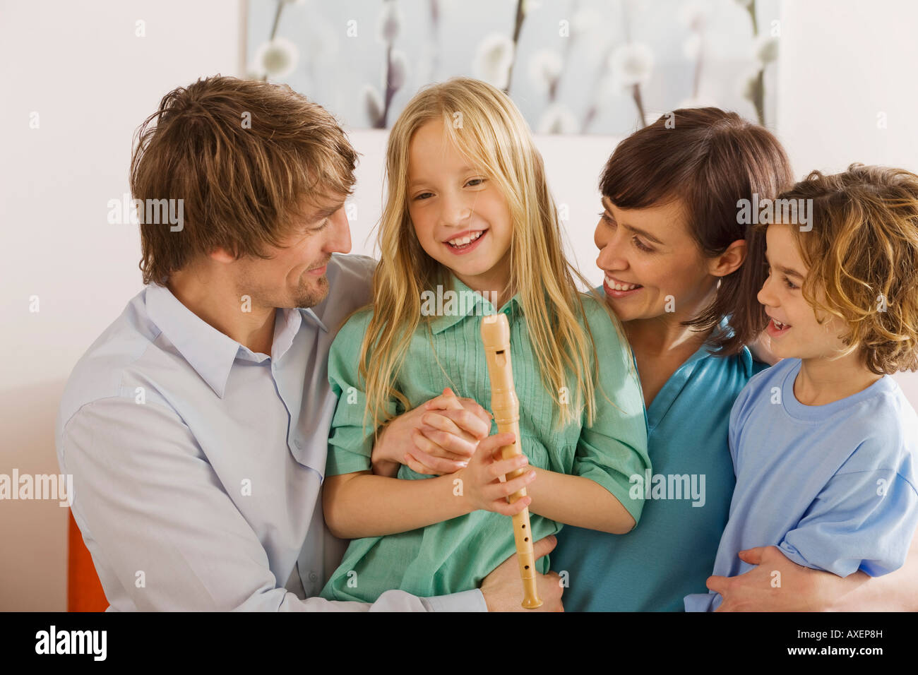 Family in living room, portrait Stock Photo - Alamy