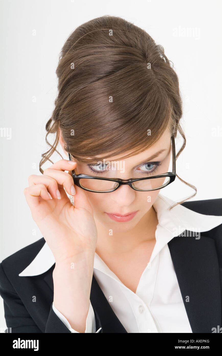 Businesswoman wearing glasses Stock Photo - Alamy