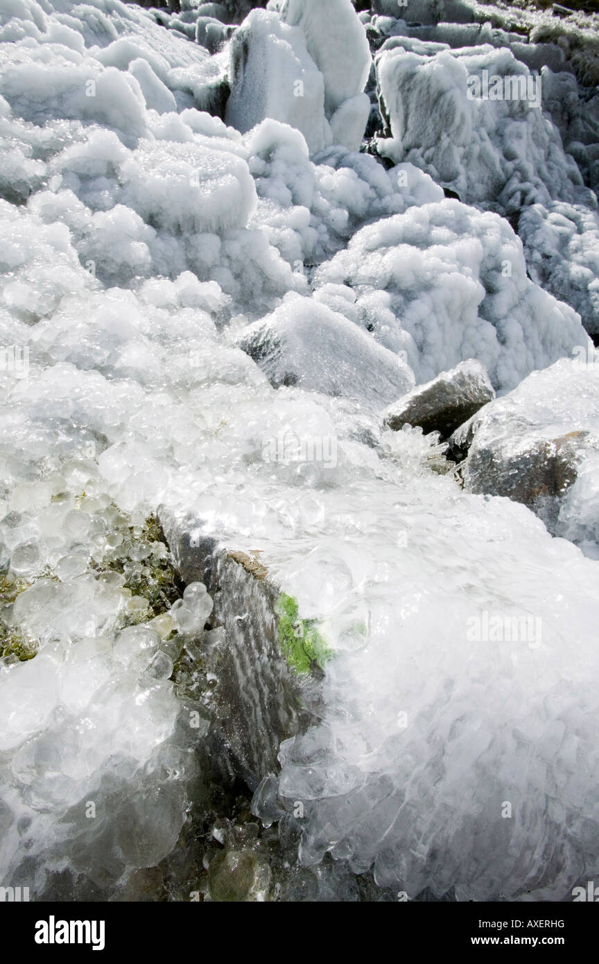 Icing on rocks caused by a strong wind blowing water onto frozen rocks ...