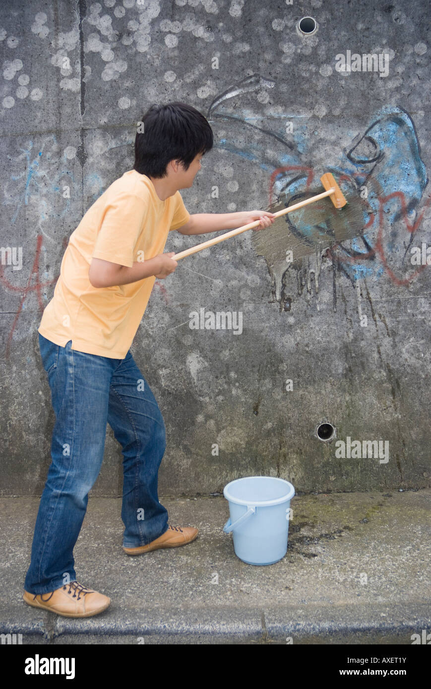 People Cleaning Walls