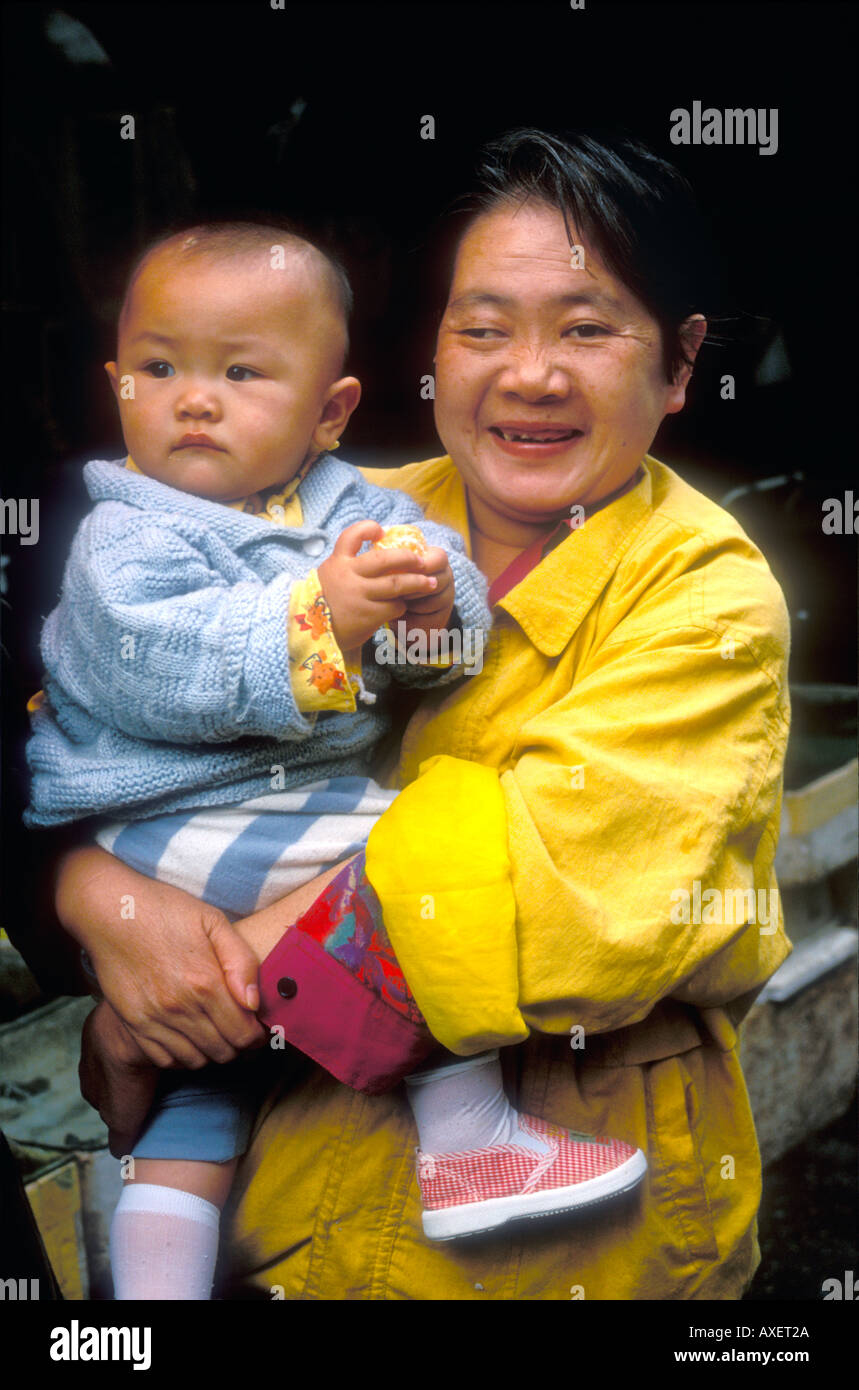 Chinese baby with proud smiling mother, Shanghai, China Stock Photo - Alamy