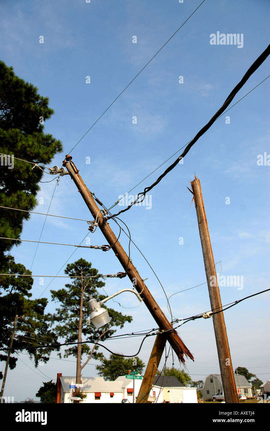 Storm damage hurricane electric power pole snapped by strong wind Stock ...
