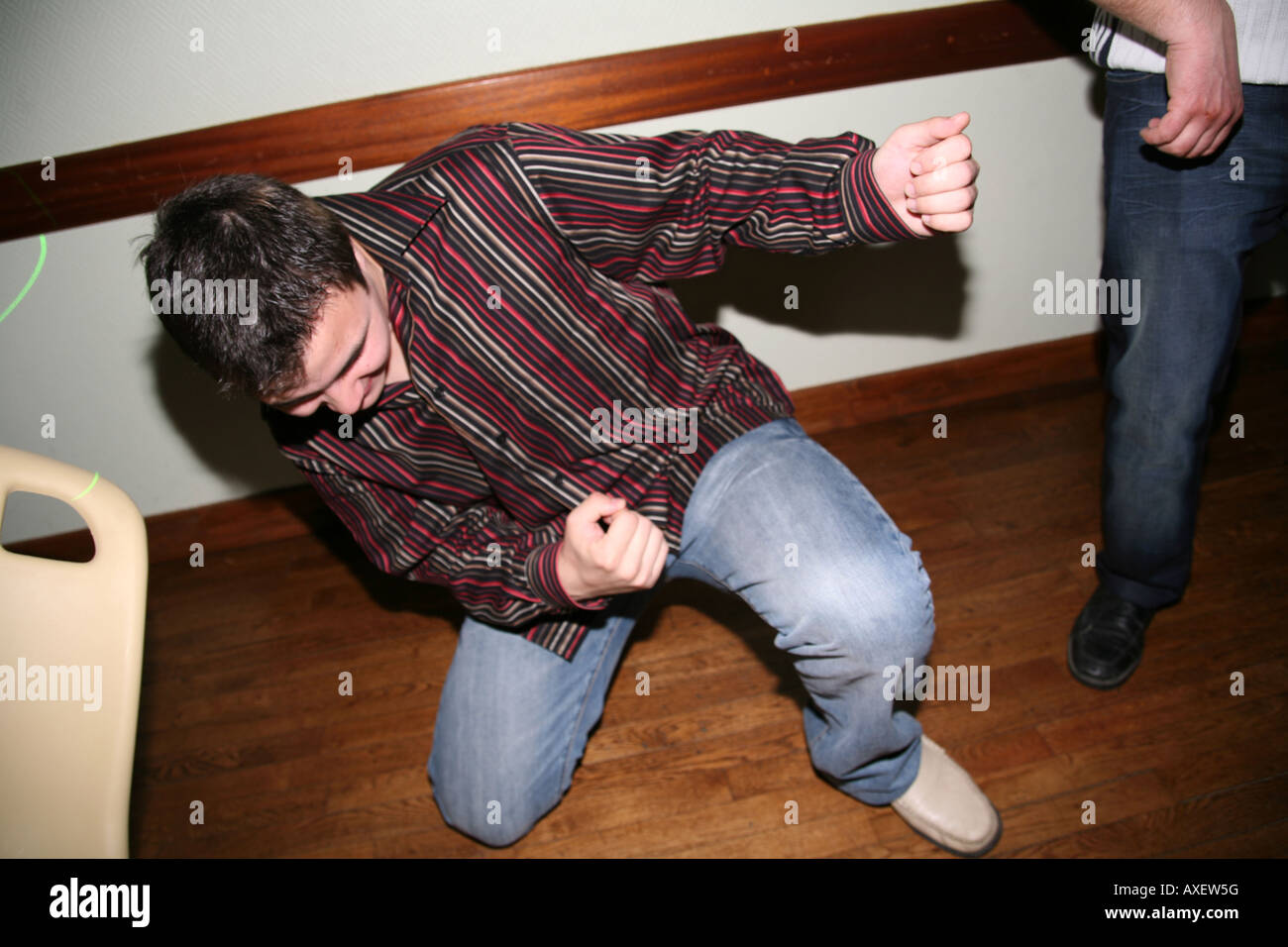 Boy dancing at a party Stock Photo - Alamy