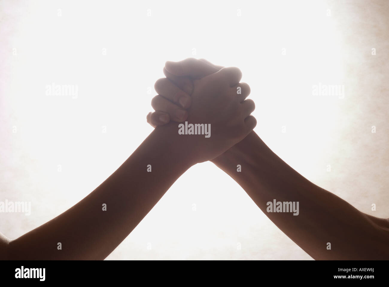 Two people shaking hands Stock Photo - Alamy