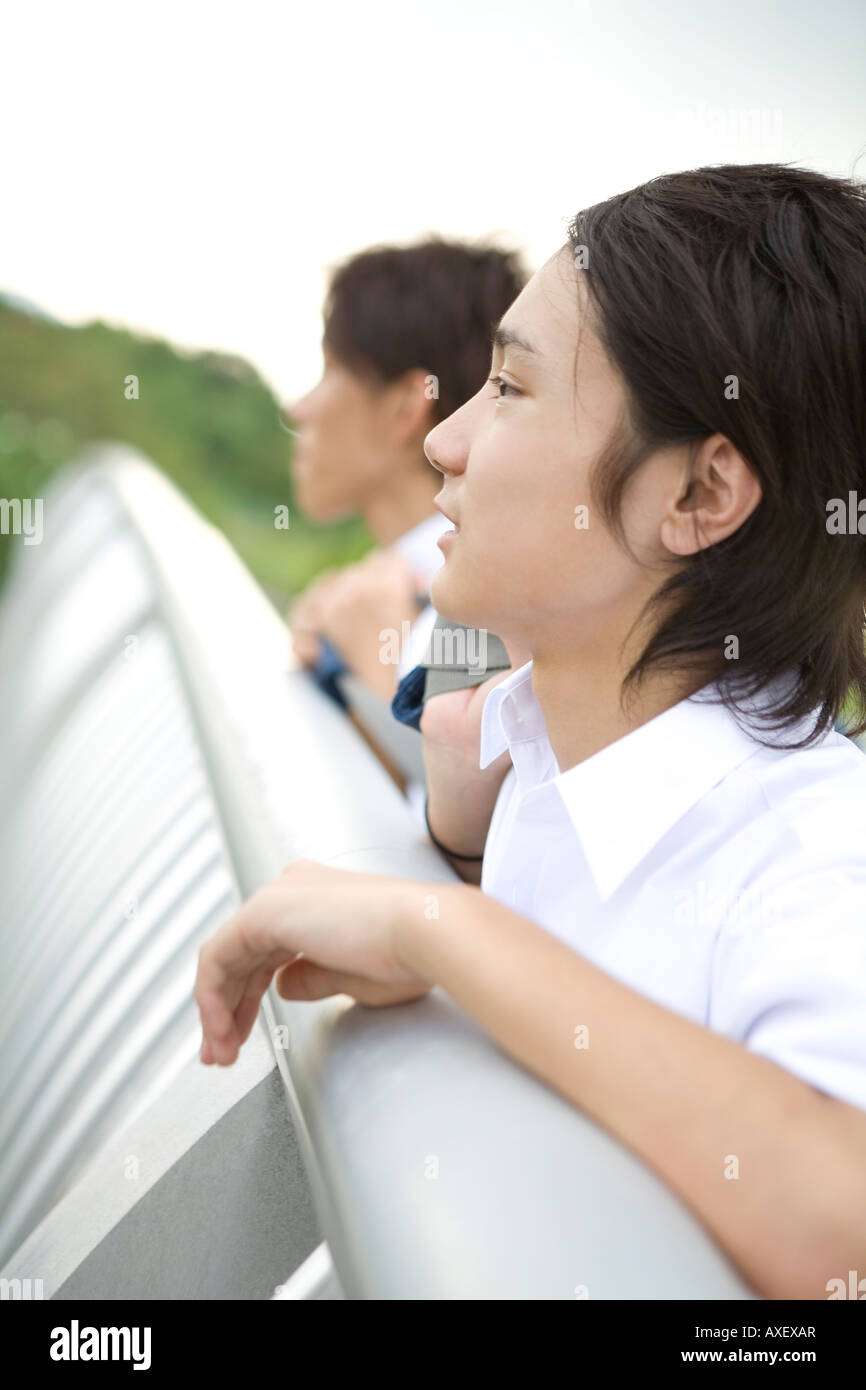 Two teenage boys talking Stock Photo - Alamy