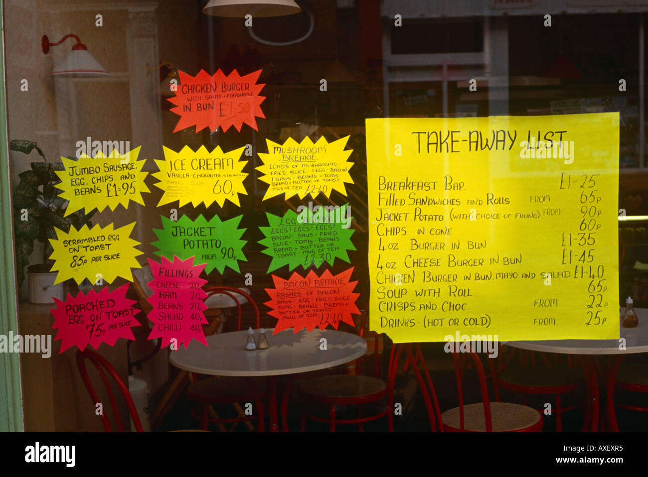 A take-away menu is displayed in a City of London cafe window Stock ...