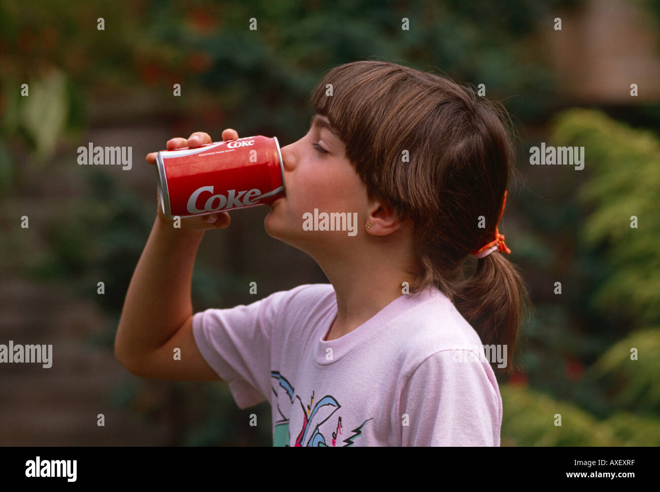 Girl drinking can coke hi-res stock photography and images - Alamy