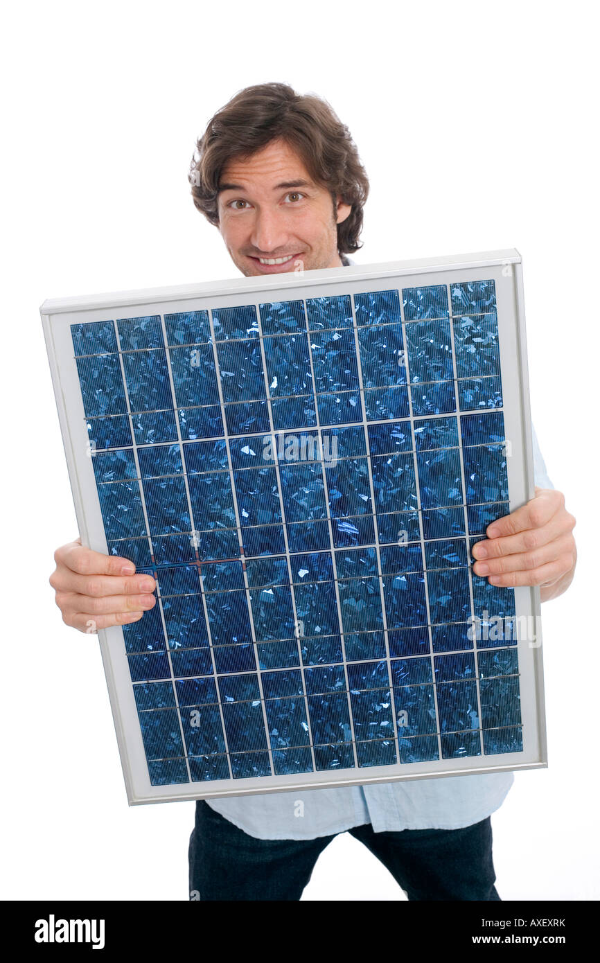 Man holding solar panel Stock Photo - Alamy