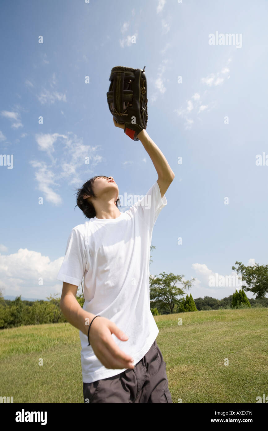 One teenage boy playing catch Stock Photo - Alamy