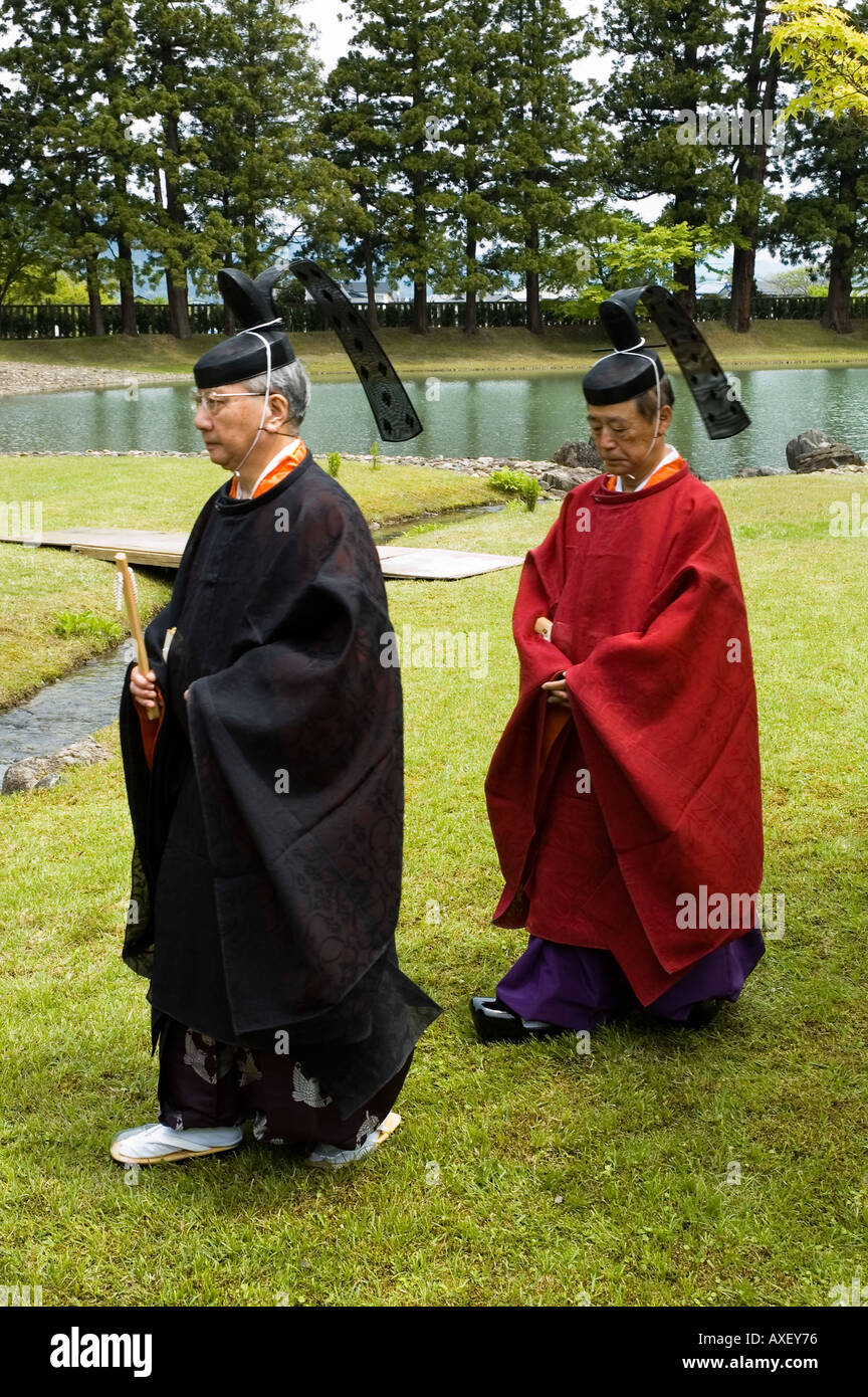 Men dressed in Heian period costume at the Gokusui no en festival in ...