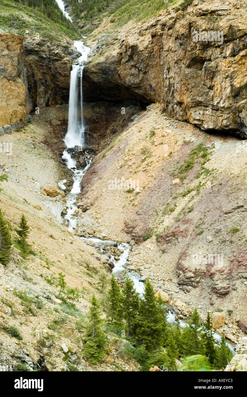 The Crypt Lake Falls plunge off a cliff in Waterton Lakes National Park ...