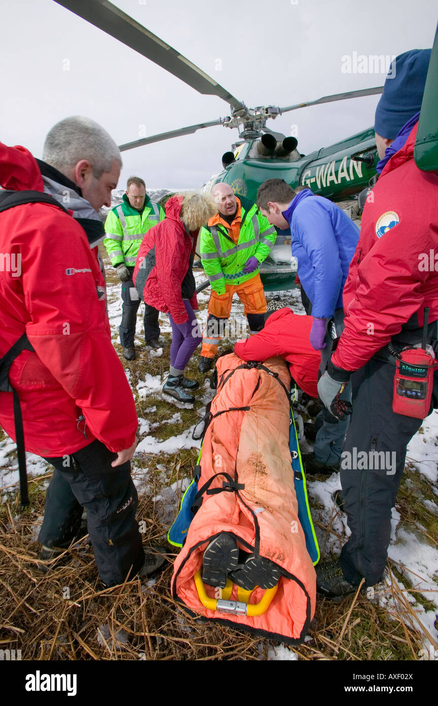 Members of Langdale Ambleside Mountain Rescue Team and an air ambulance ...