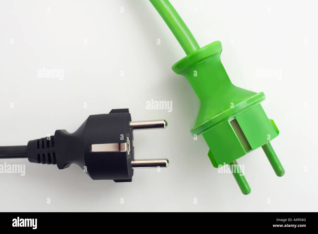 Black and green plugs, close-up Stock Photo - Alamy