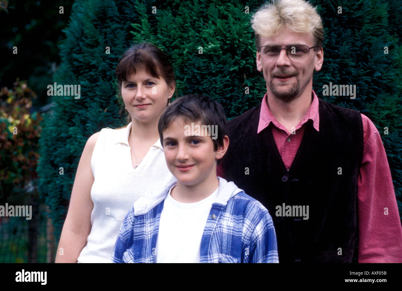 Family with single child portrait Stock Photo - Alamy