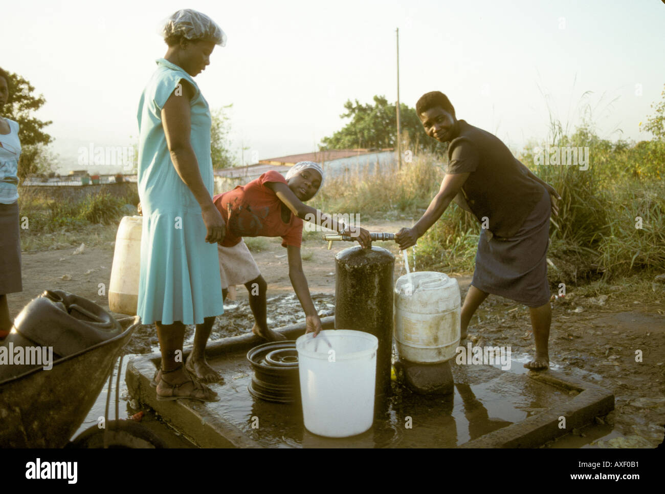 Water standpipe women hi-res stock photography and images - Alamy
