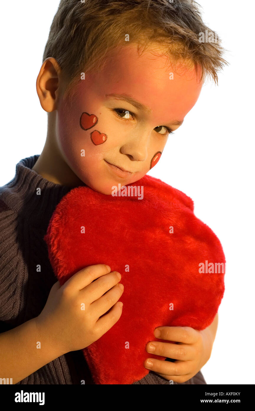 Lovely boy with painted heart face Use it for valentine designs or just ...