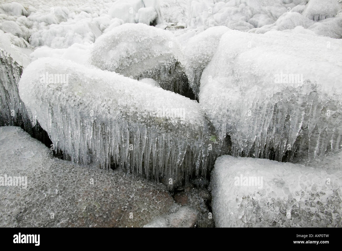 Icing on rocks caused by a strong wind blowing water onto frozen rocks ...