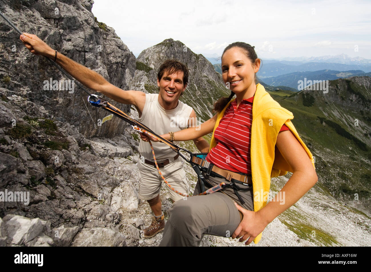 Austria, Salzburger Land, couple mountain climbing Stock Photo - Alamy