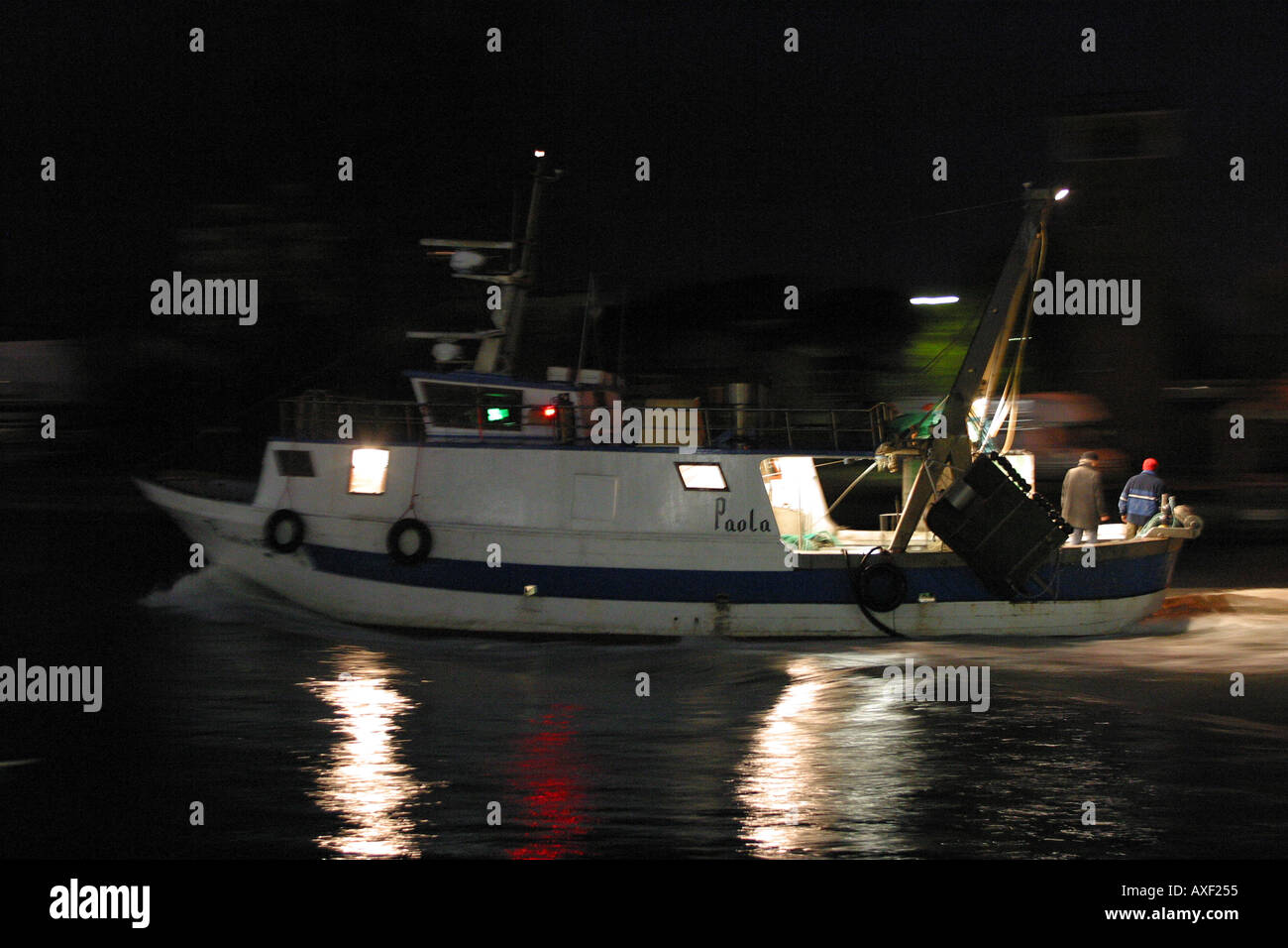 italian trawler on the way out to do some night fishing Stock Photo - Alamy