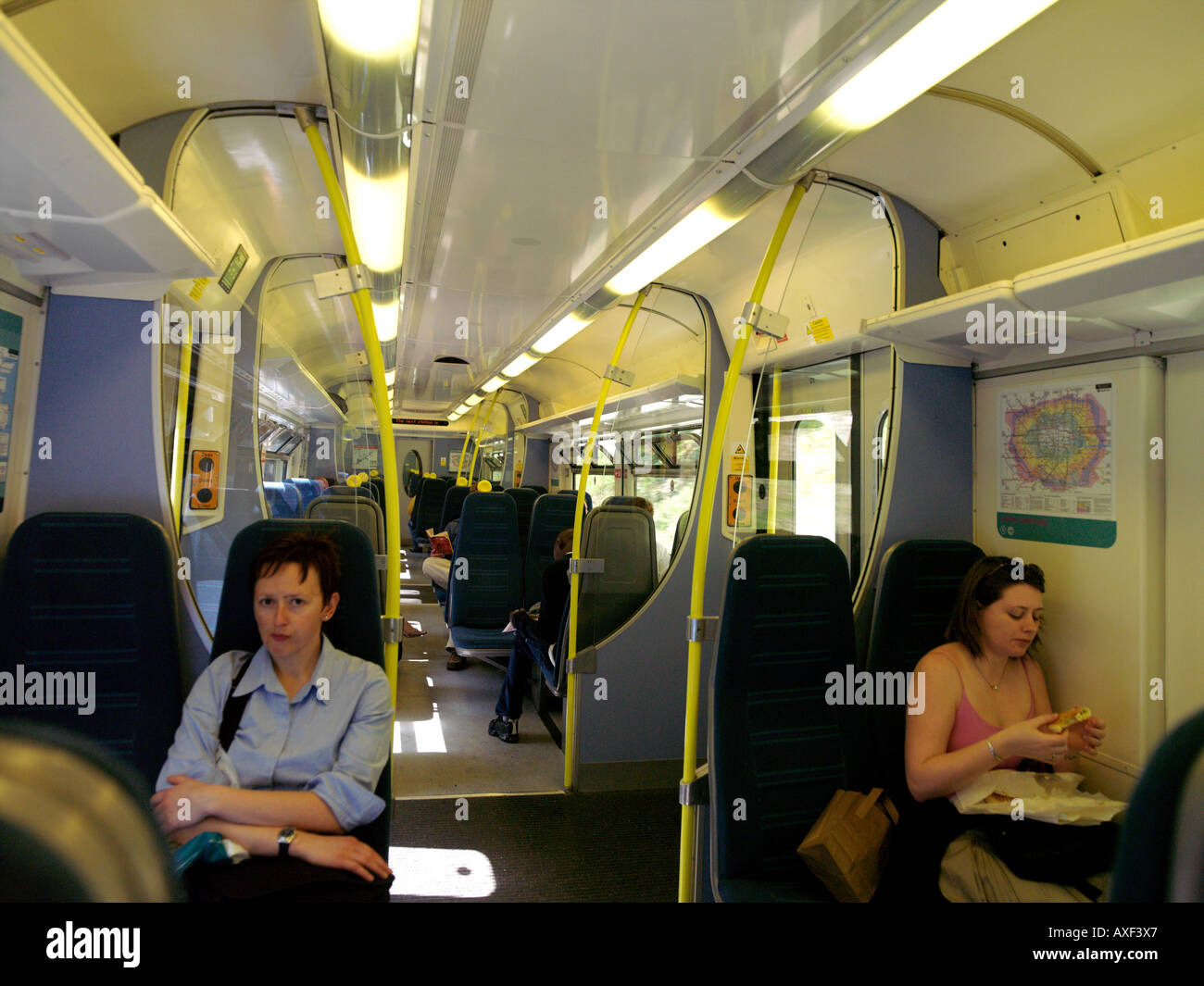 Commuter Train Interior Showing Passengers going from Surrey to London ...