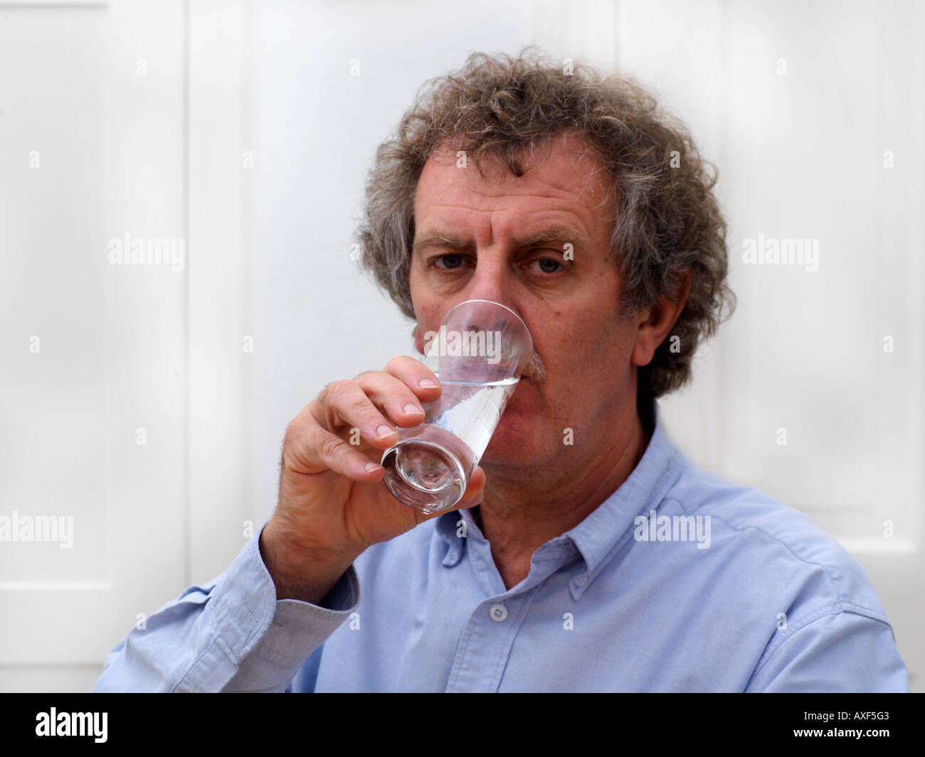 Man Drinking Glass of Water Stock Photo - Alamy